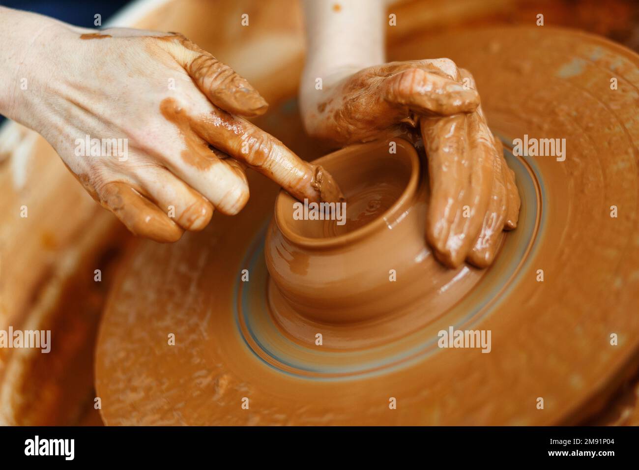 Potter molding clay pitcher hi-res stock photography and images - Alamy