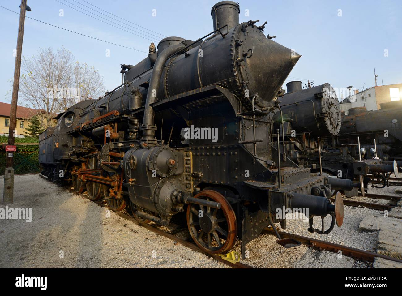 Antique steam locomotives displayed around a loco turntable, at the ...