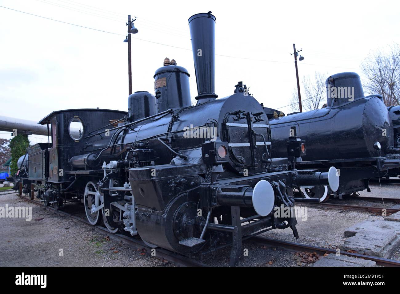 Antique steam locomotives displayed around a loco turntable, at the ...