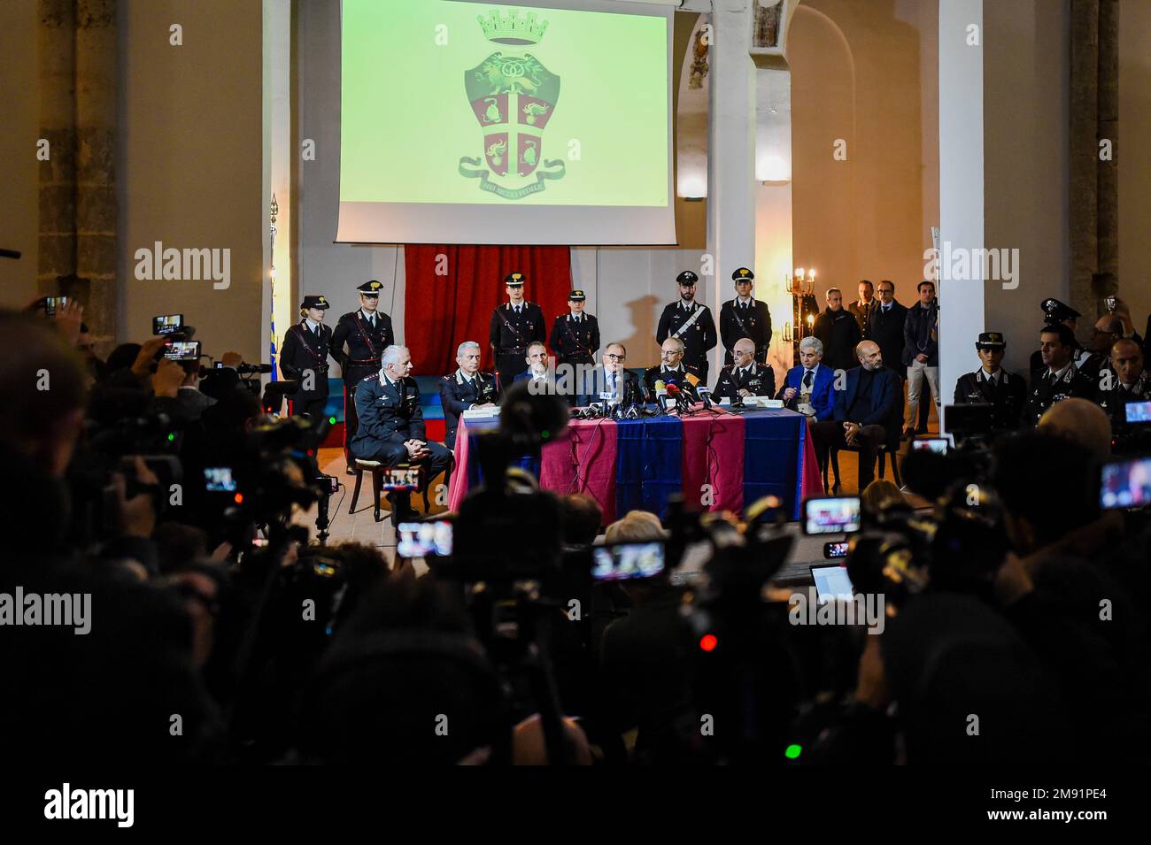 Investigators speak to reporters during a press conference in Palermo ...