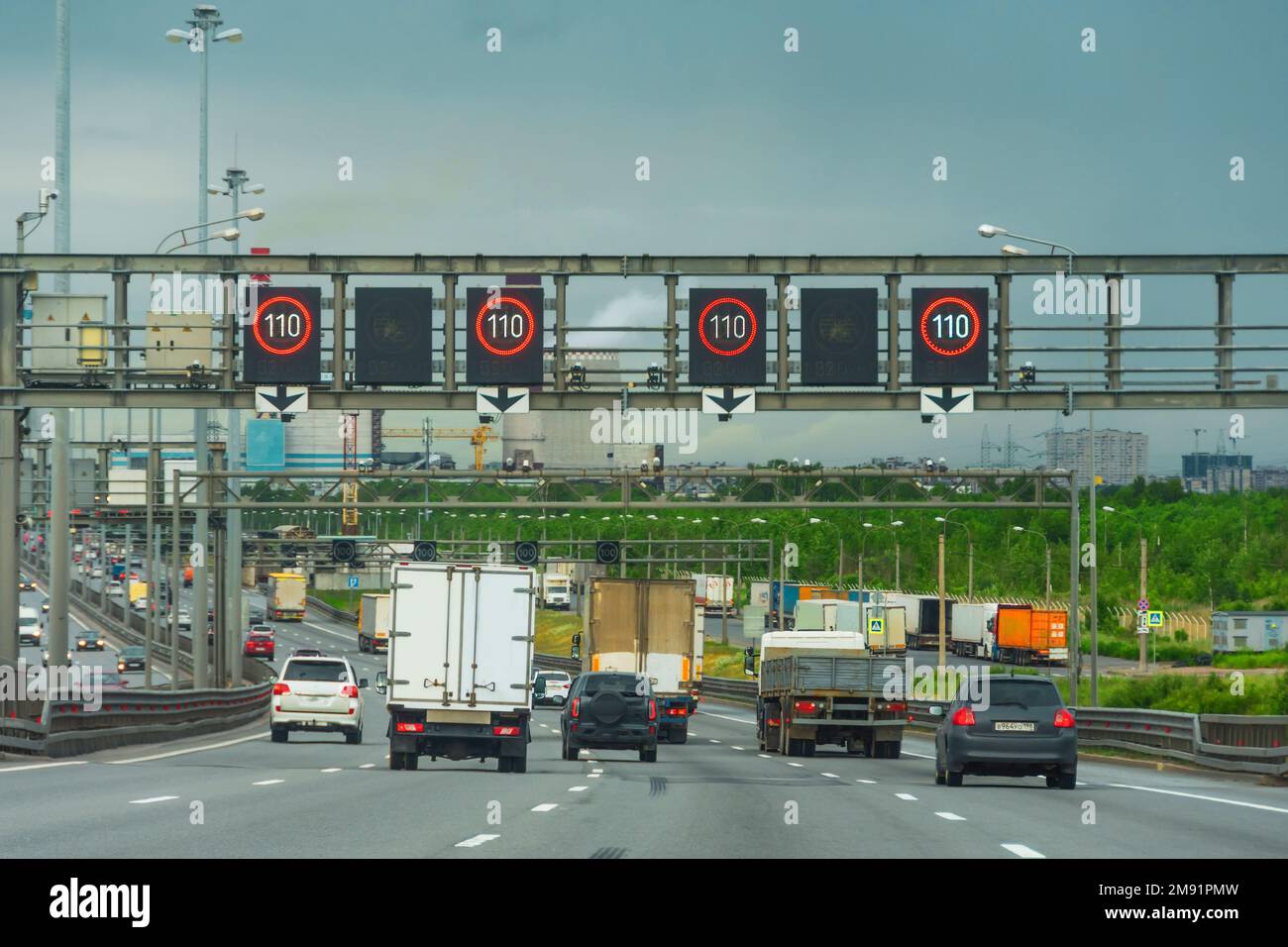 Highway suburban bypass highway loaded with high speed car traffic ...