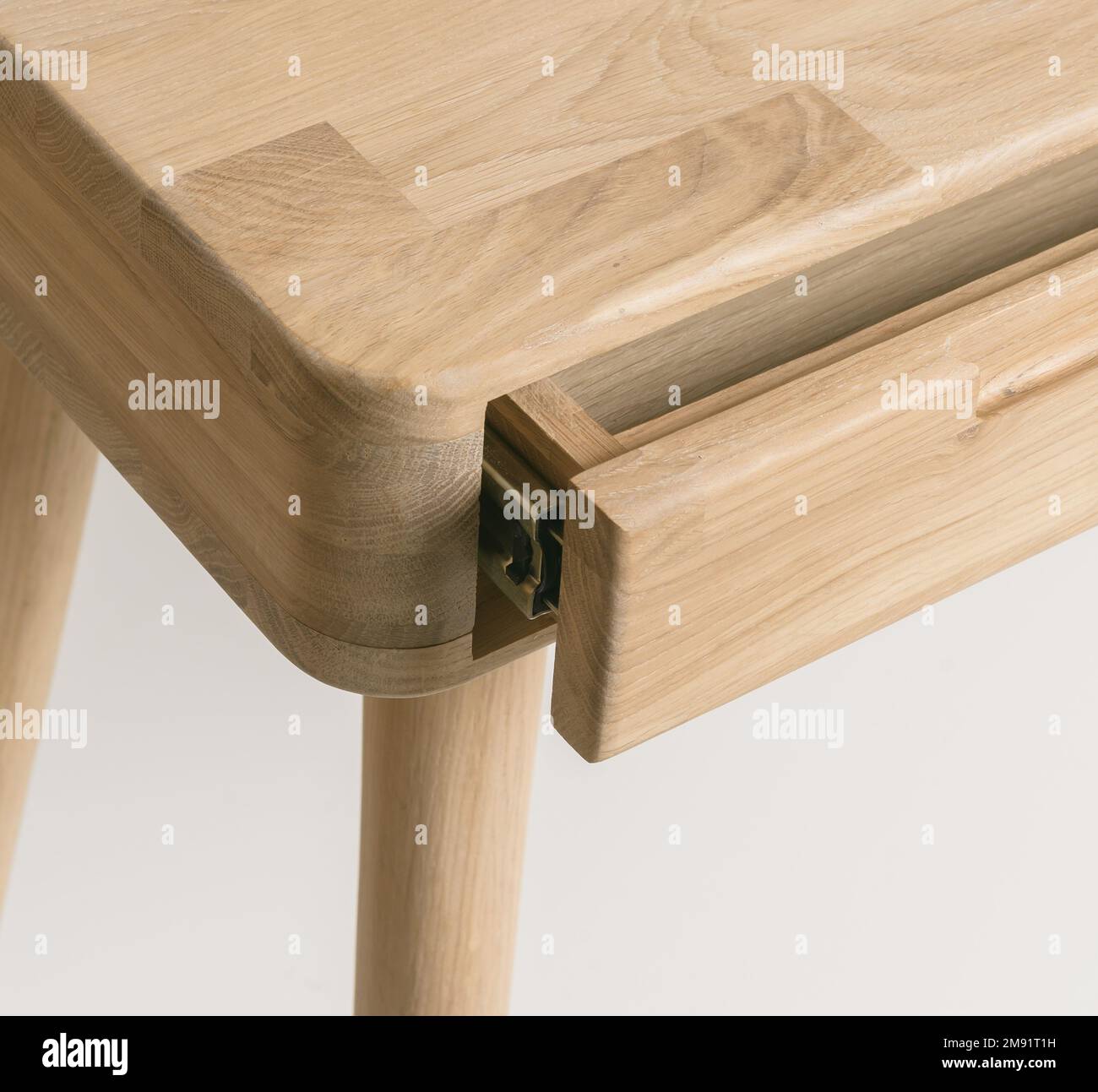 Wooden table corner with drawer and leg close view photo, wooden eco ...
