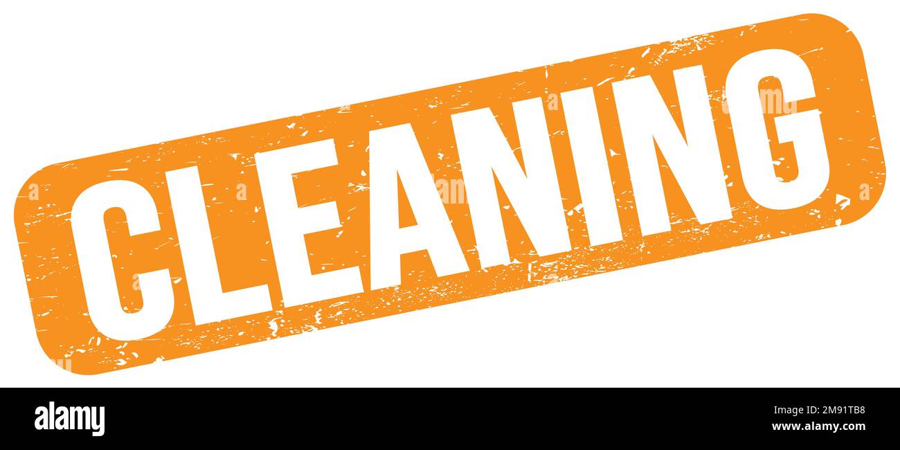 CLEANING text written on orange grungy stamp sign Stock Photo - Alamy