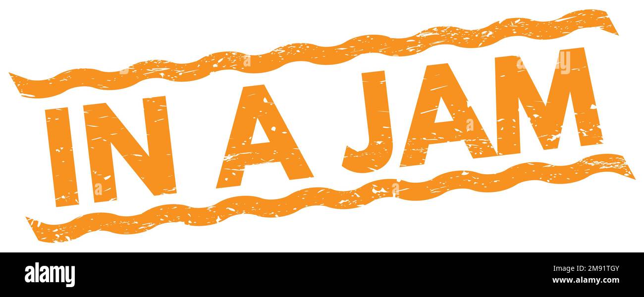 IN A JAM text written on orange lines stamp sign Stock Photo - Alamy
