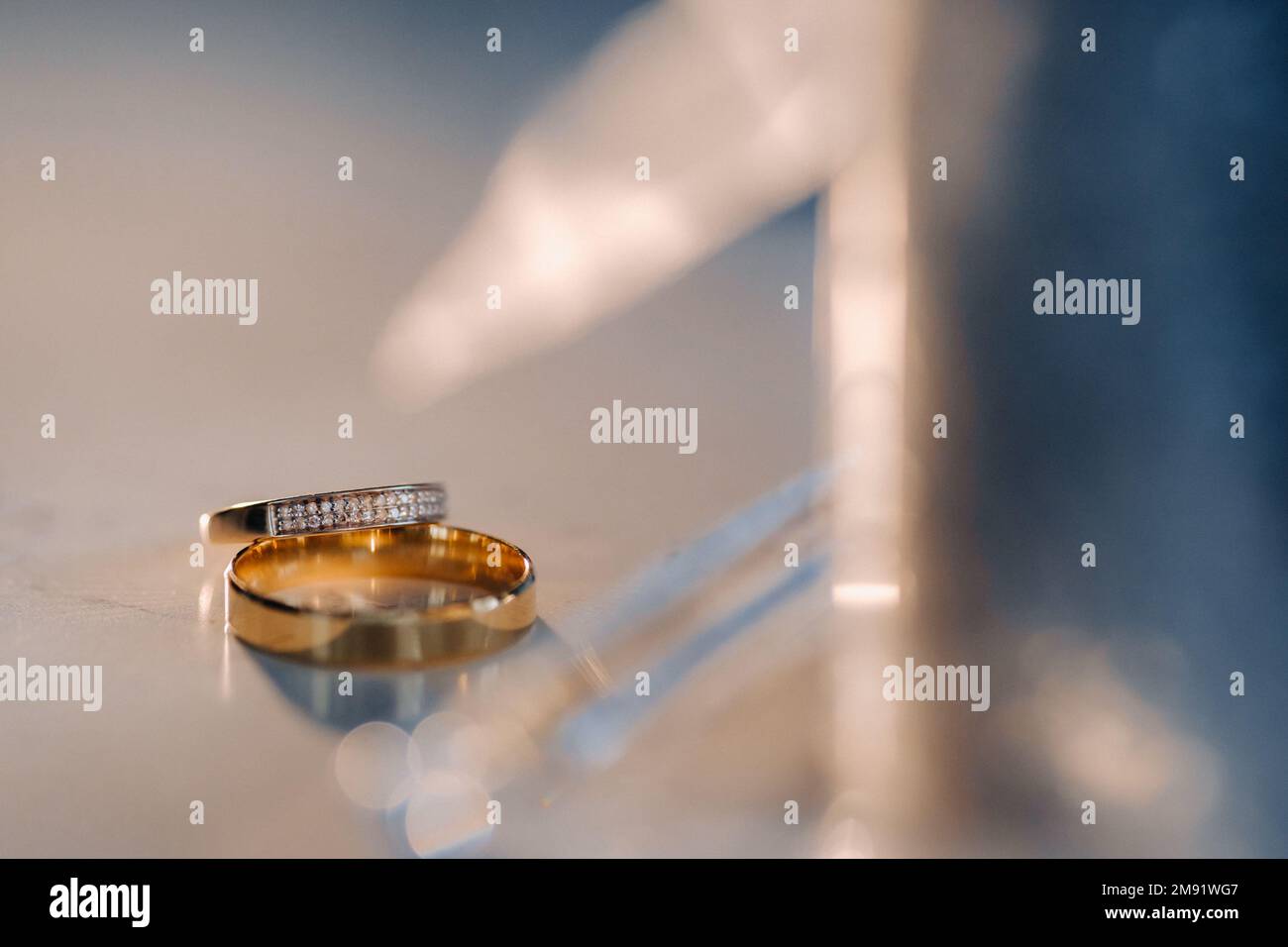 Designer wedding rings lying on the surface. Two wedding rings Stock ...