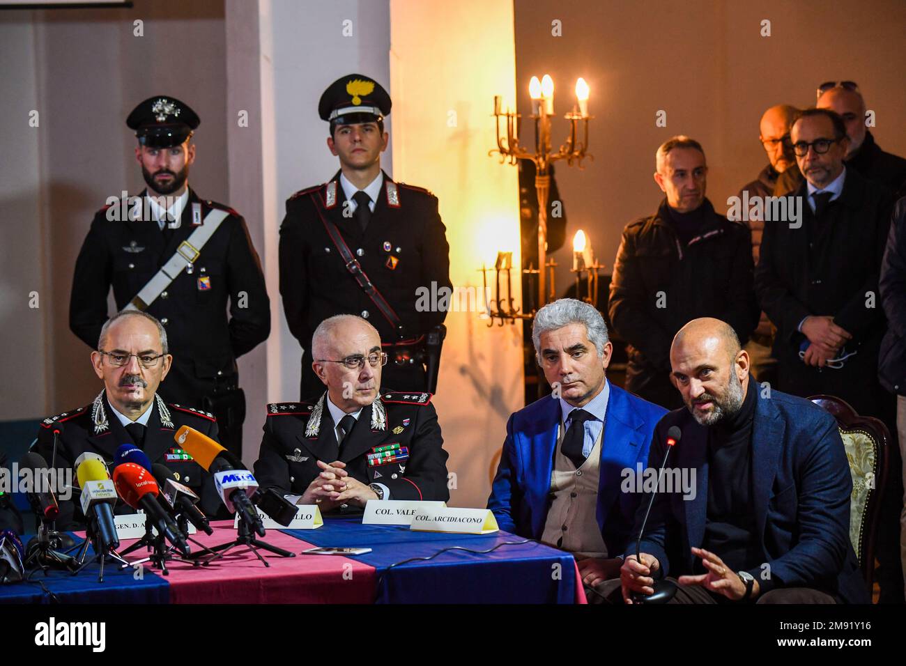 Italian Carabinieri Col. Lucio Arcidiacono, right, flanked by, from ...