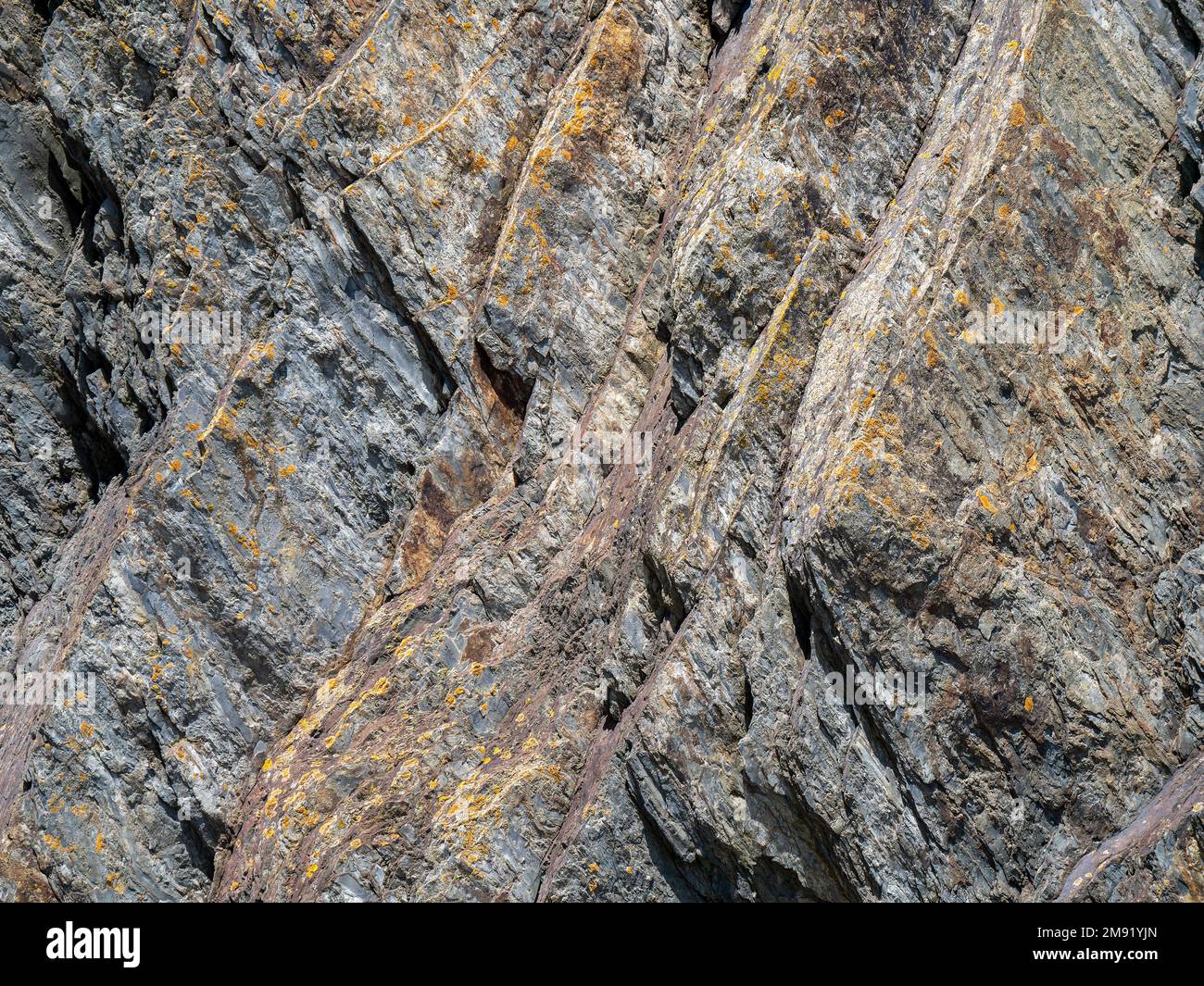 A variety of geological strata as a background. Stone texture, full ...