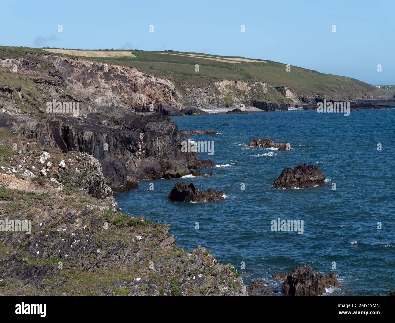 Irish sea landscape. Rocky coast of the Atlantic on a sunny day. The ...