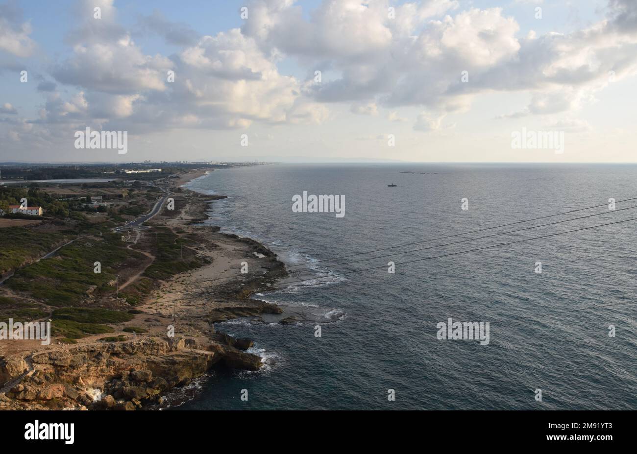 Rosh HaNikra Grottoes with white chalk cliffs and cable car in Israel ...