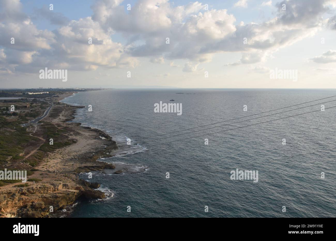 Rosh HaNikra Grottoes with white chalk cliffs and cable car in Israel ...