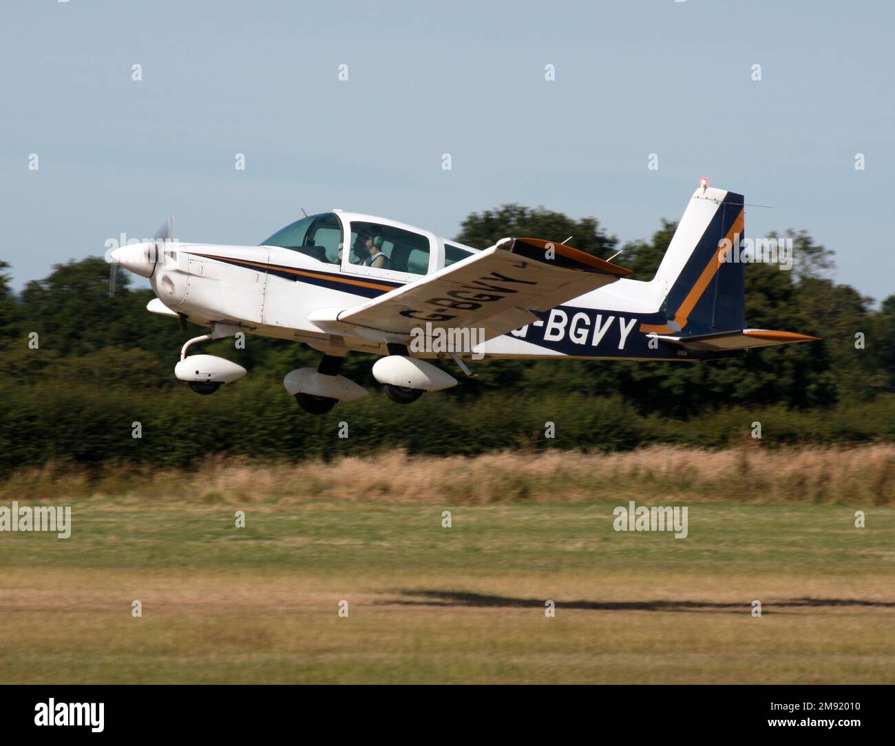 A Grumman American AA-5B Tiger depart Headcorn airfield Kent Stock ...