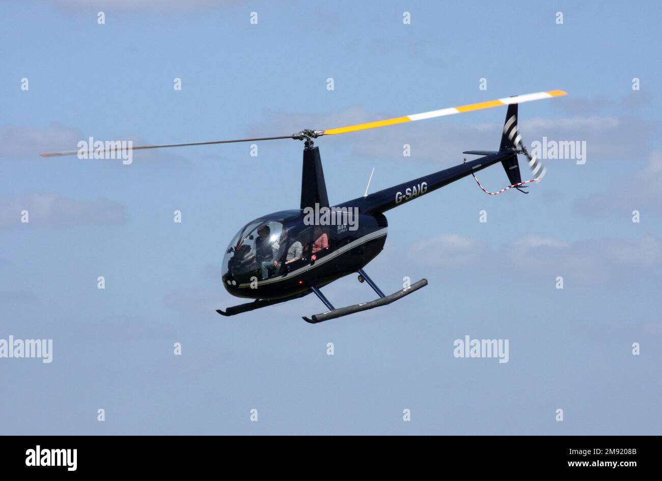 A Robinson R44 Clipper II helicopter Stock Photo - Alamy