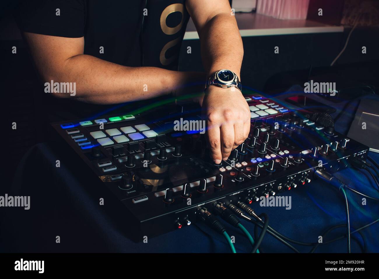 DJ plays hands on professional mixer at night club party Stock Photo ...