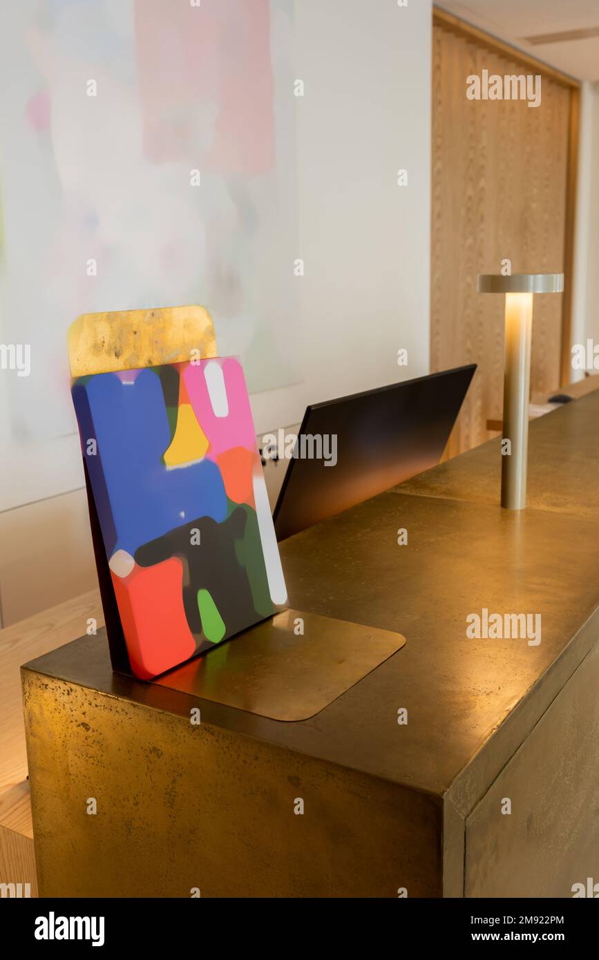 abstract painting at reception desk with computer monitor,stock image ...