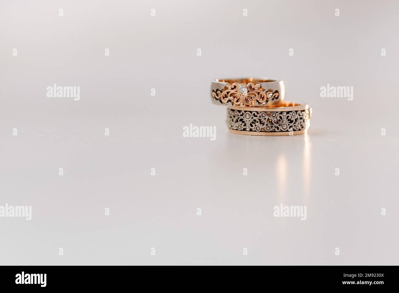 Designer wedding rings lying on the surface. Two wedding rings Stock ...