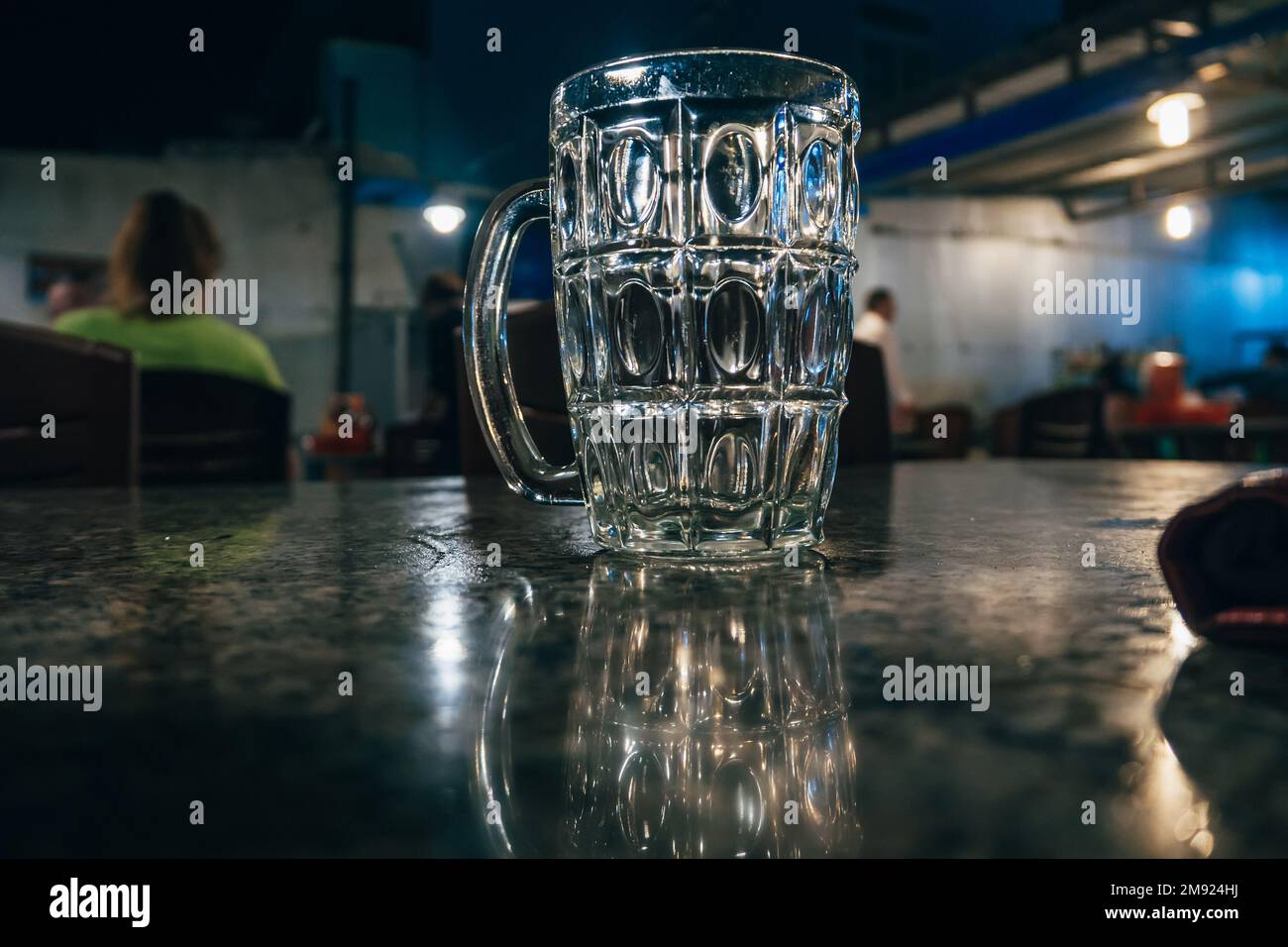 empty beer mug on table in bar close up Stock Photo - Alamy