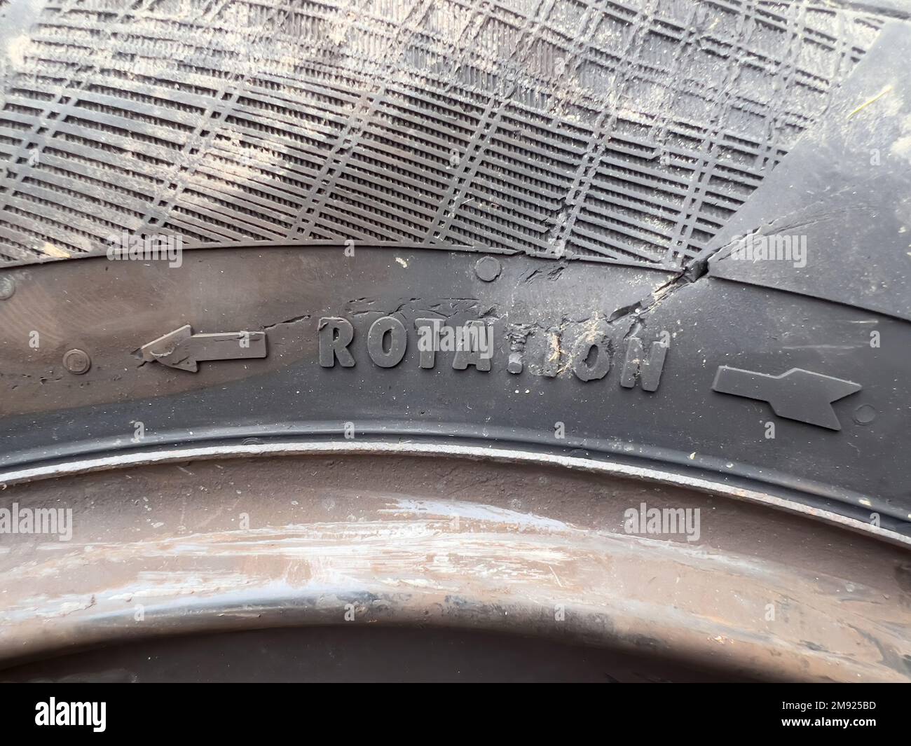 Rotation arrow on the damaged car tyre tire after accident Stock Photo ...