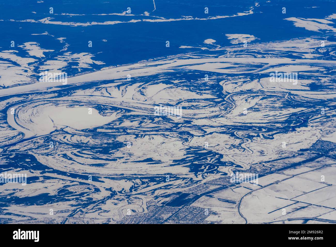 aerial photography from the height of the aircraft fields and rivers in ...