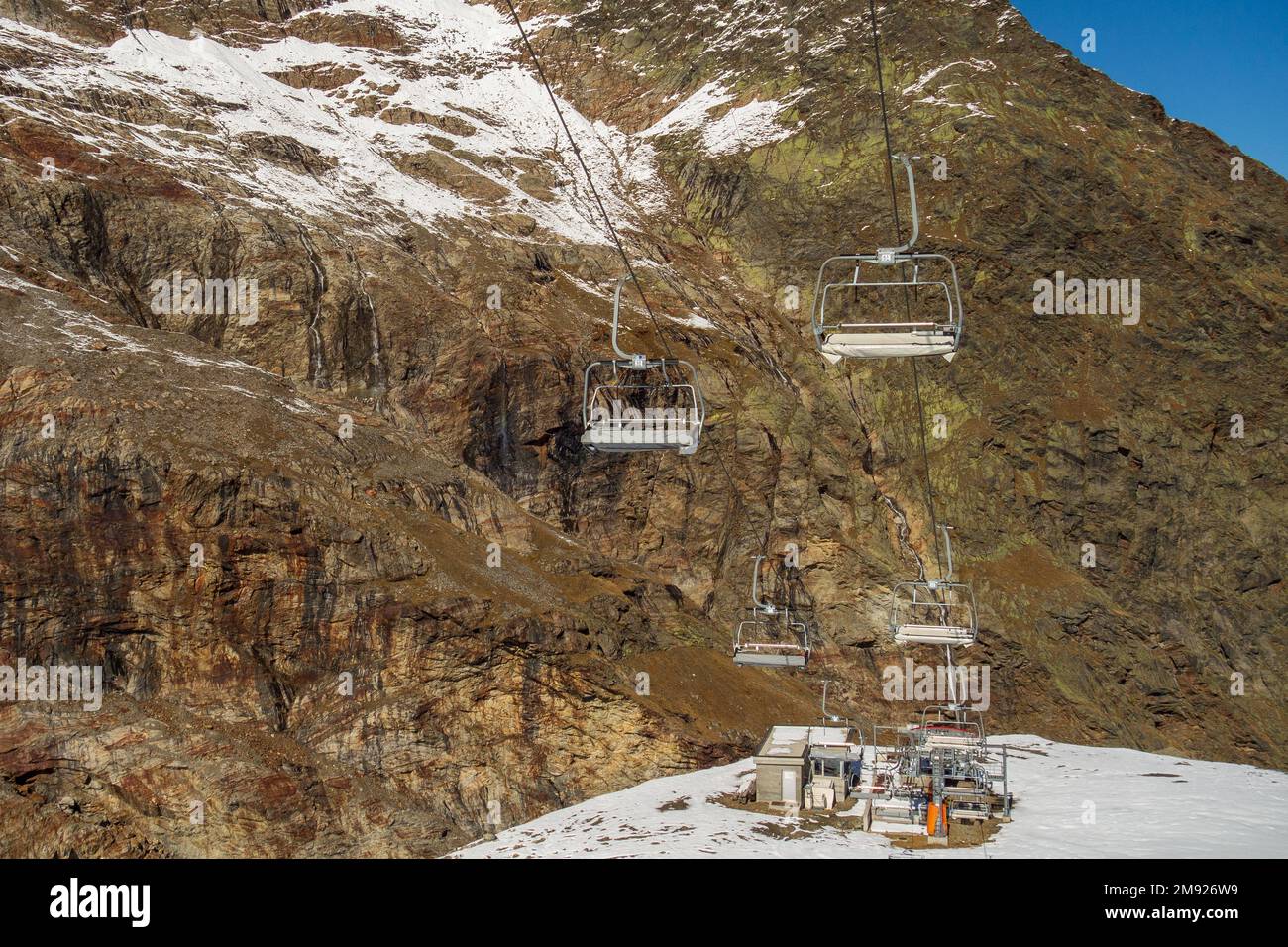 The ropeway in the the snow-capped mountains in the alps of Switzerland ...
