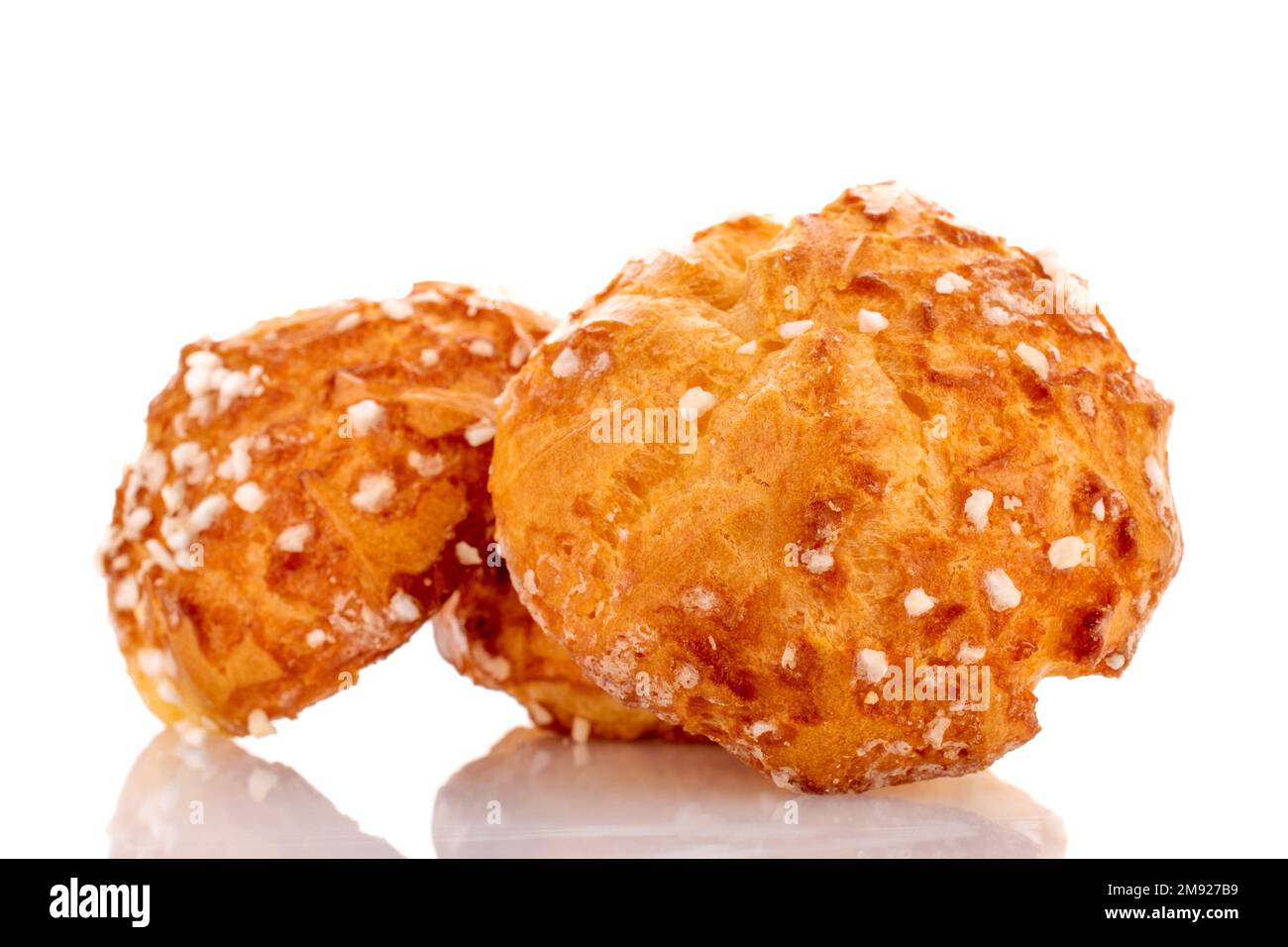 Three sweet chouquette, close-up, isolated on white Stock Photo - Alamy