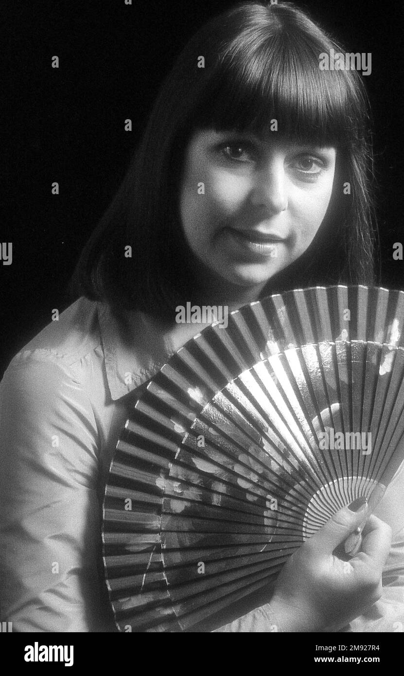 Keeping cool with a fan hi-res stock photography and images - Alamy