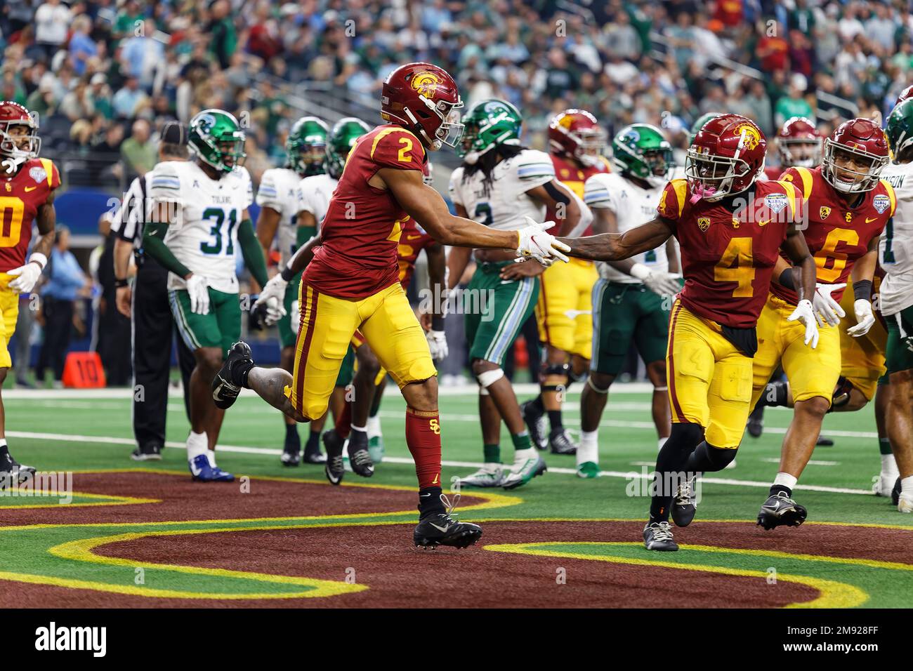Southern California Trojans wide receiver Brenden Rice (2) is greeted ...