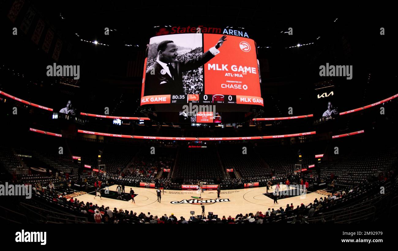 Martin Luther King Jr. is displayed on a screen before an NBA ...