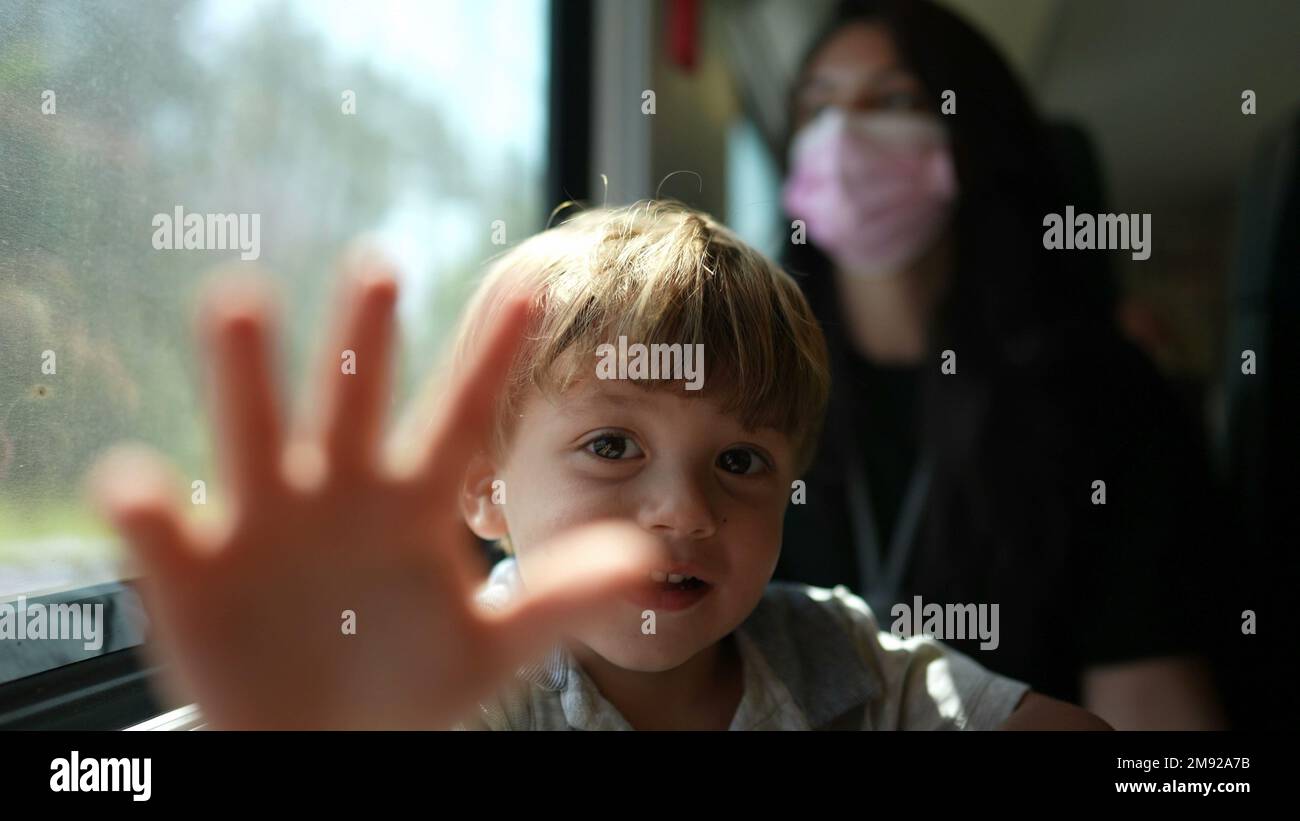 Child wanting to touch camera. Little boy touching lens Stock Photo - Alamy