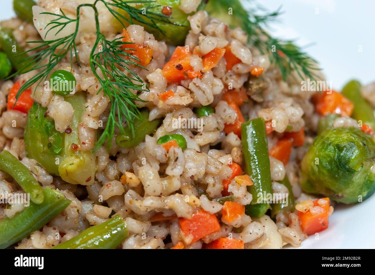 Vegetarian crumbly pearl barley porridge with vegetables Brussels ...