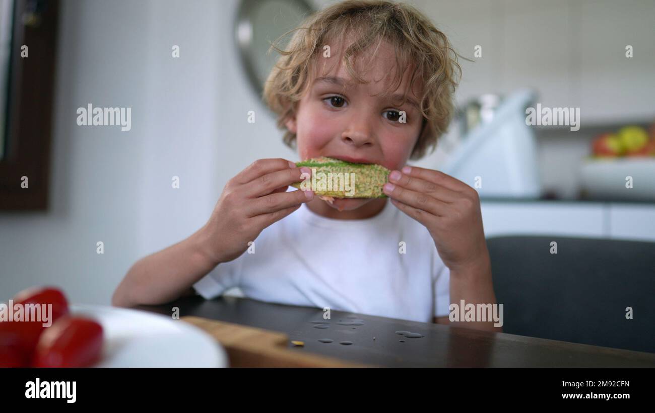 Child eating melon fruit. Portrait kid eating healthy food2 Stock Photo ...