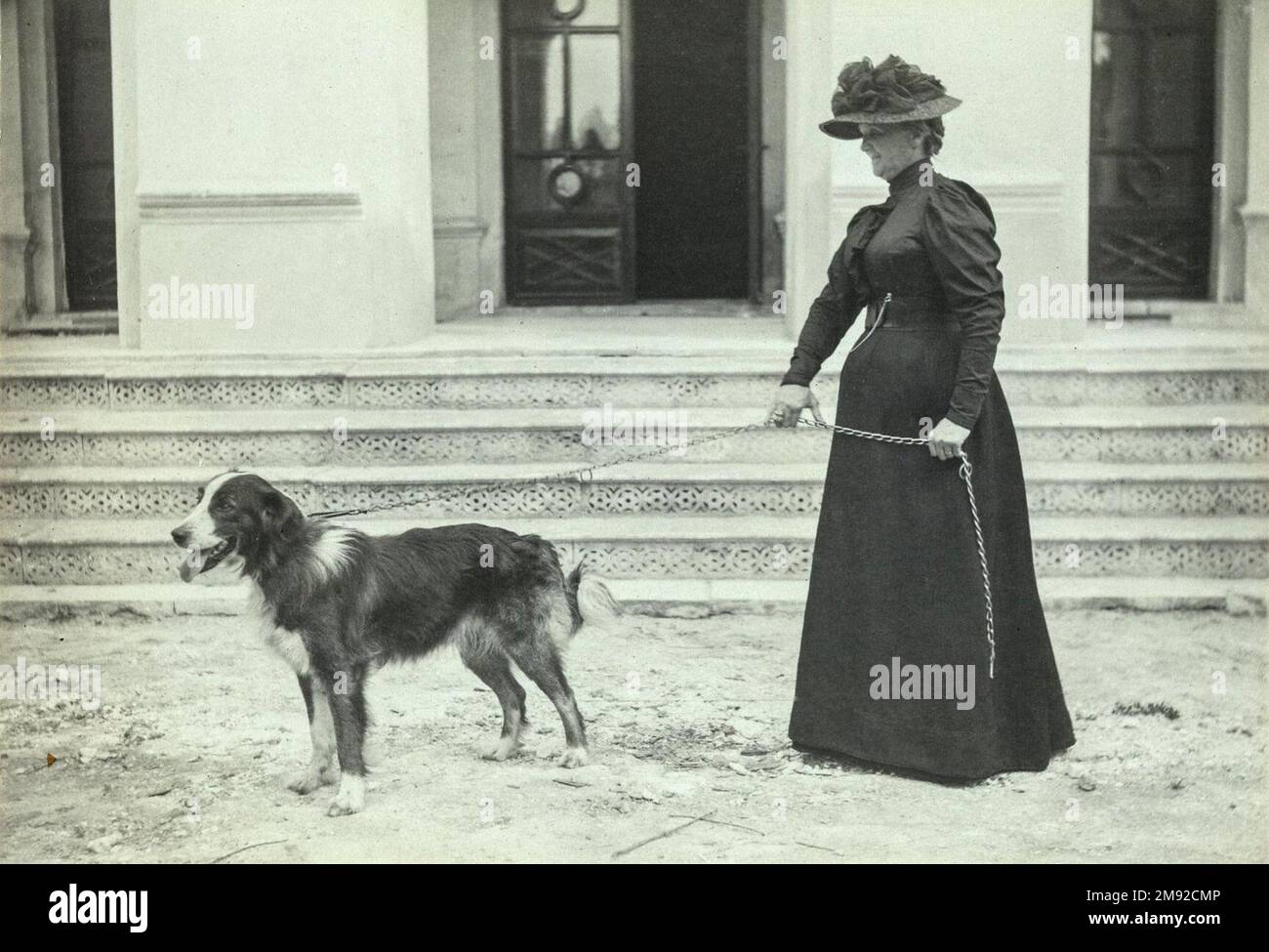 Countess PS Uvarova with a dog in the courtyard of the Krasnaya Gorka ...
