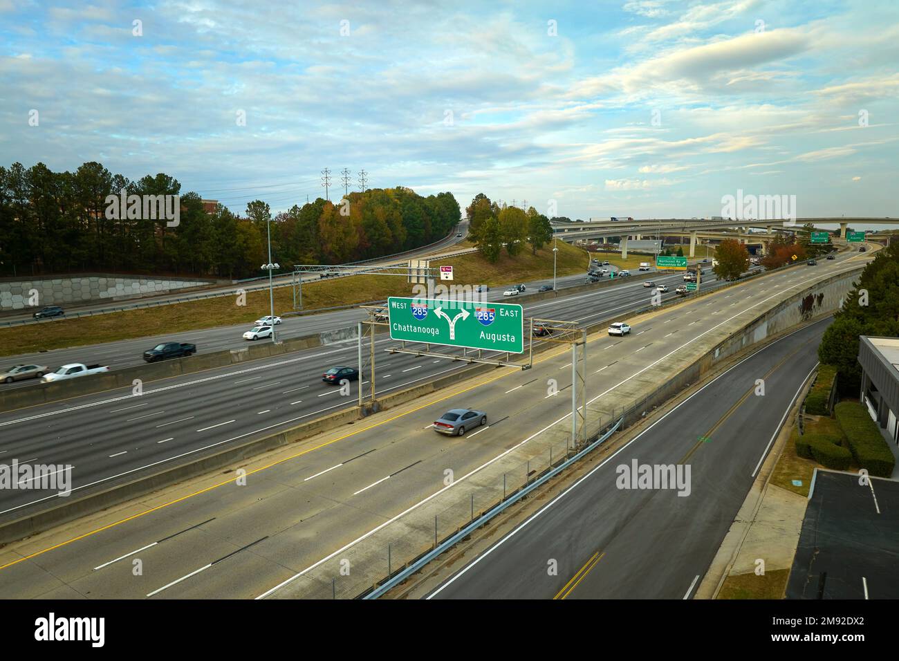 Aerial view of american freeway intersection with fast moving cars and ...