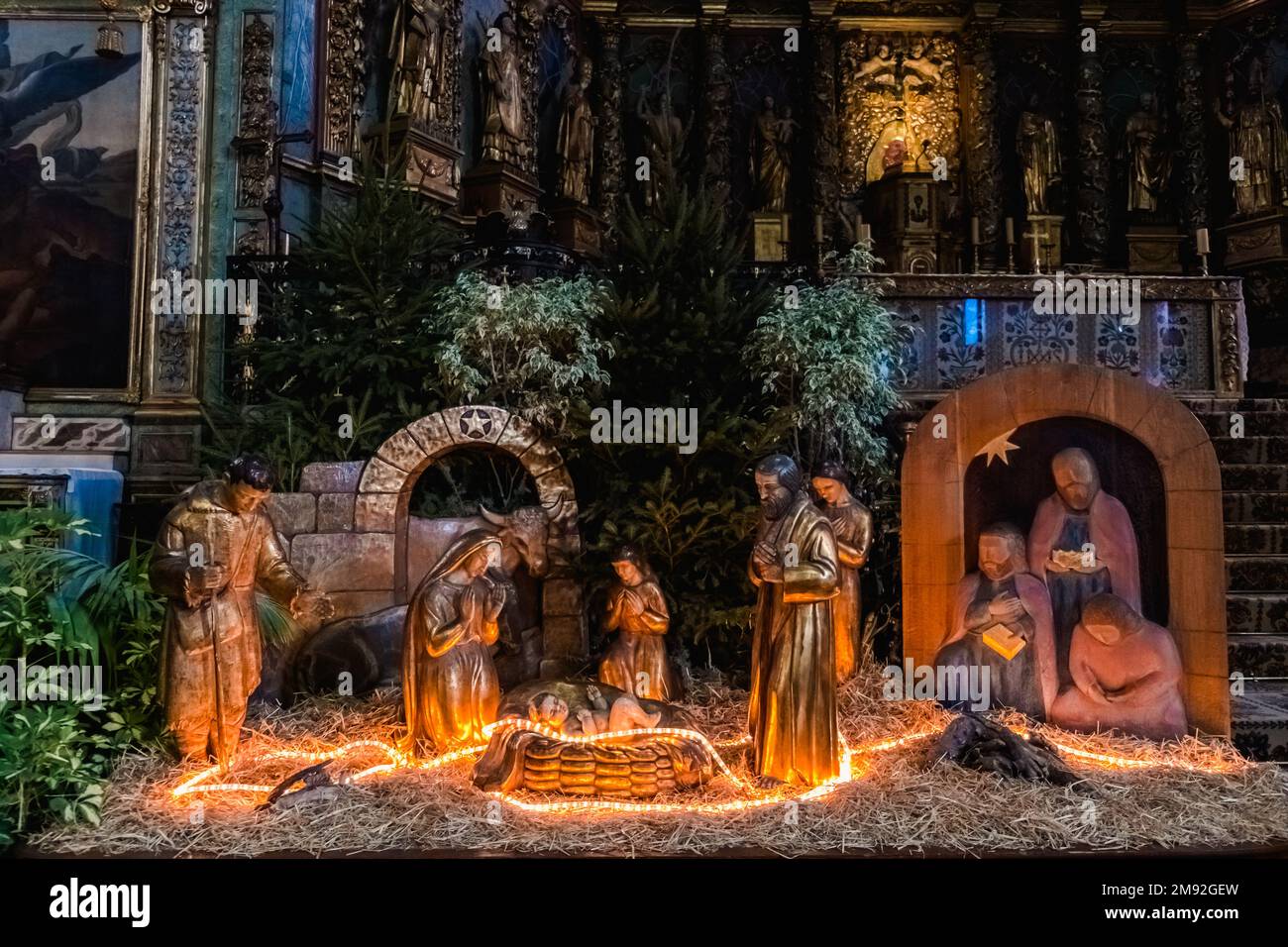 Figures of a classic nativity scene decorated with beautiful artistic ...