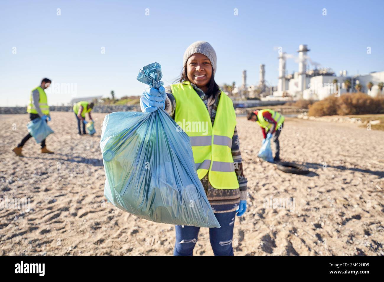 Group of people holding plastic bag hi-res stock photography and images ...