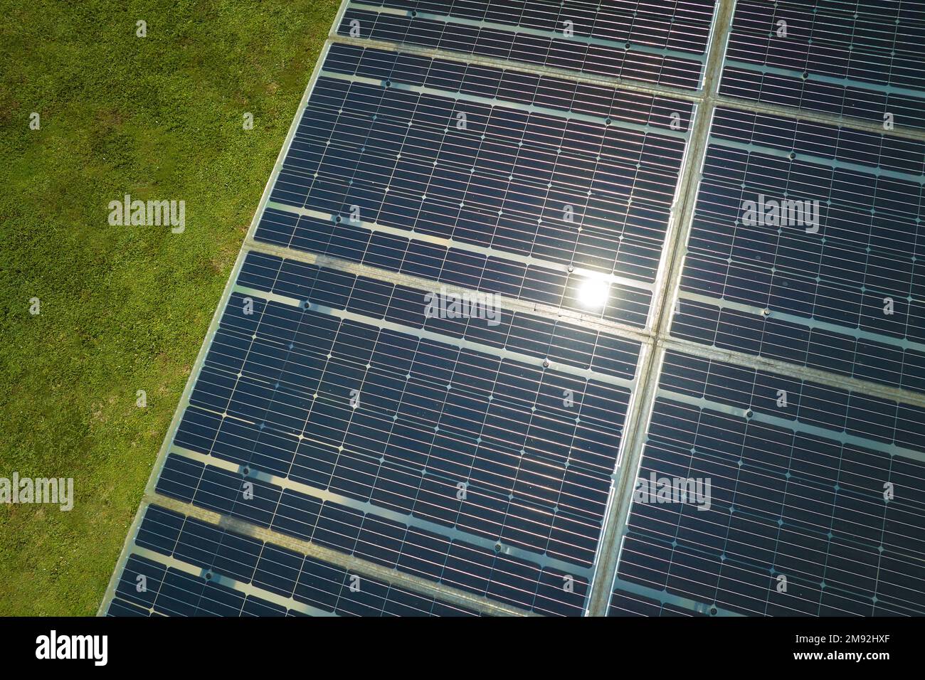 Aerial view of solar panels installed as shade roof over parking lot ...