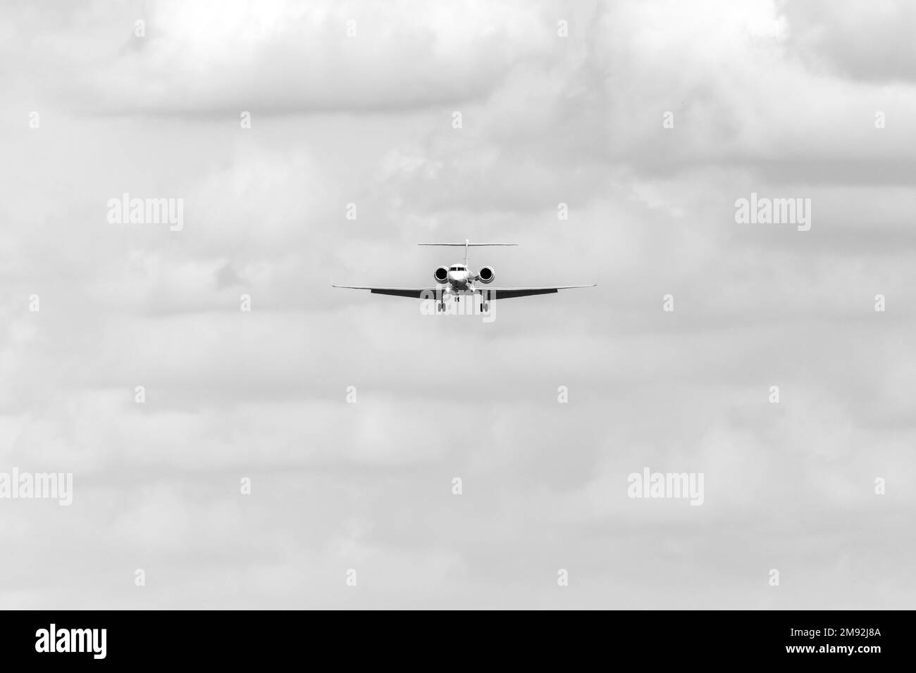 Plane flying through air Black and White Stock Photos & Images - Alamy