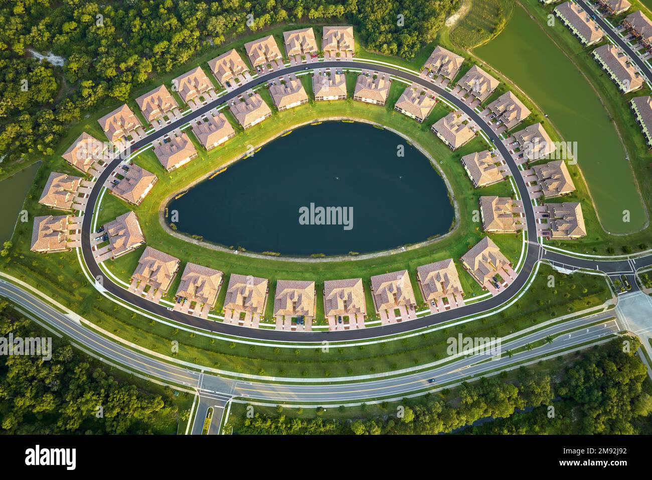 Aerial view of tightly packed homes in Florida closed living clubs with ...