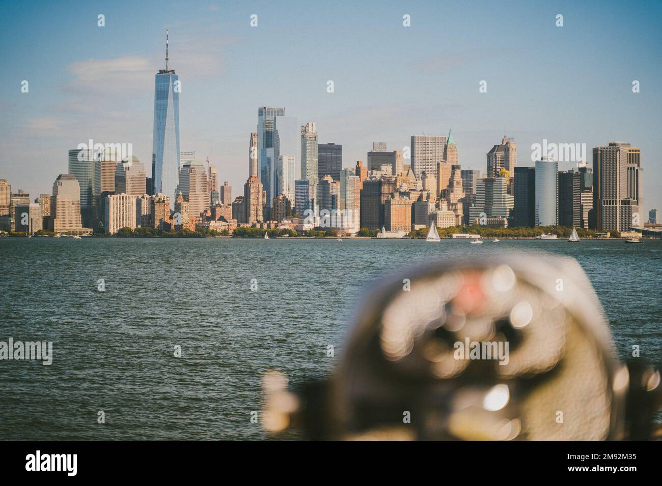 Modern binoculars located on observation platform near waving sea ...