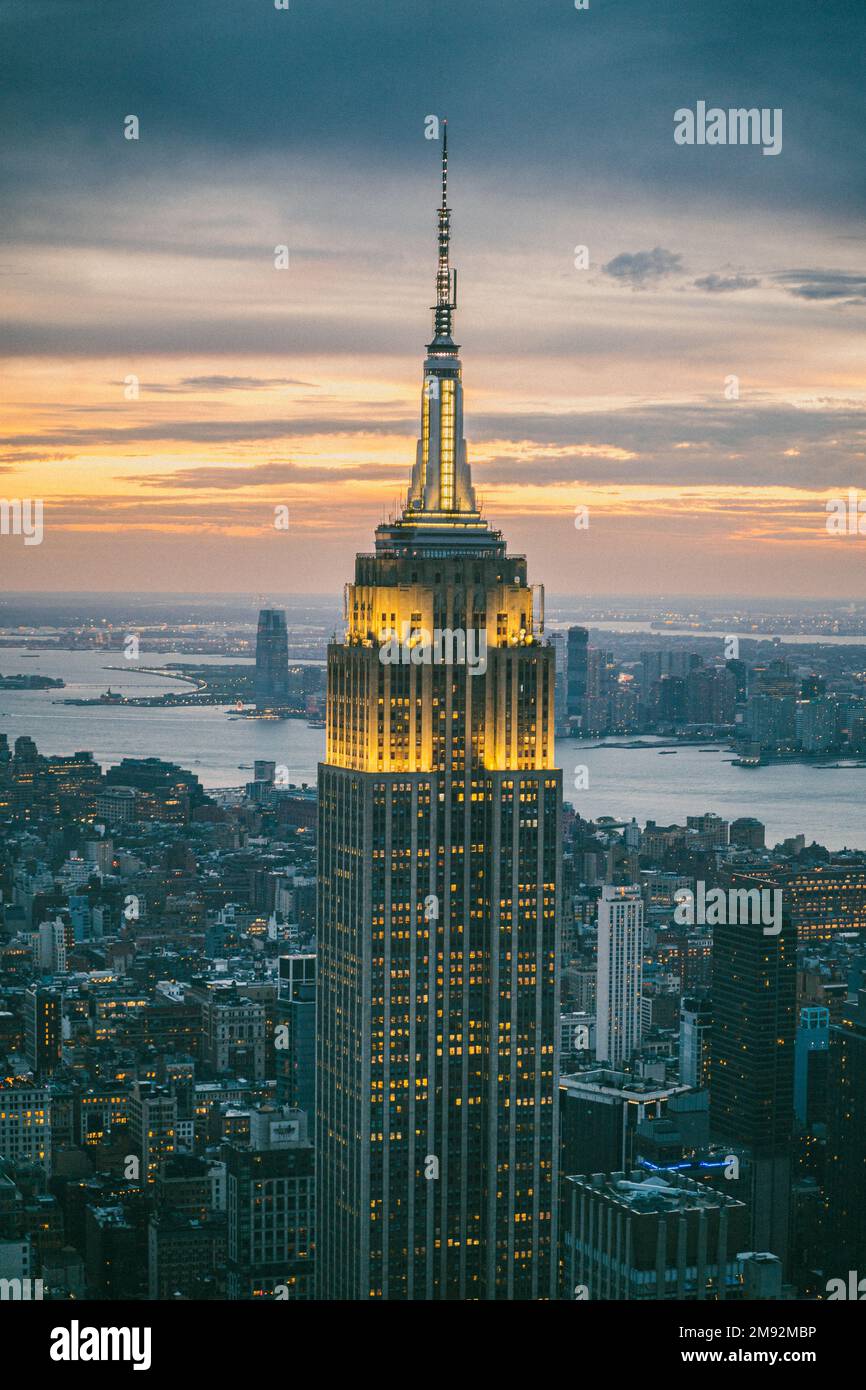 Aerial view of skyscrapers and river near famous tall Empire State ...