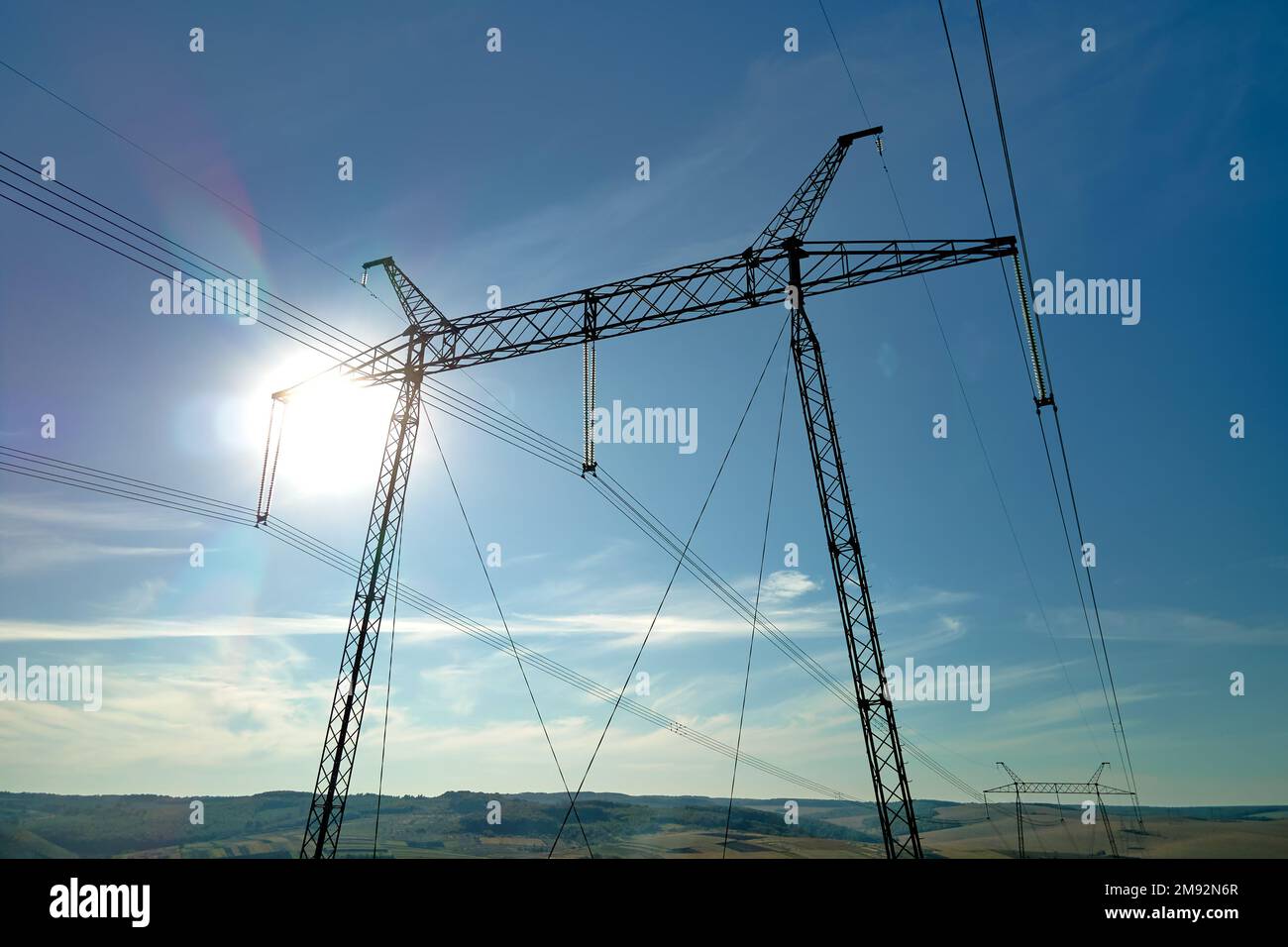 High voltage tower with electric power lines transfening electrical ...