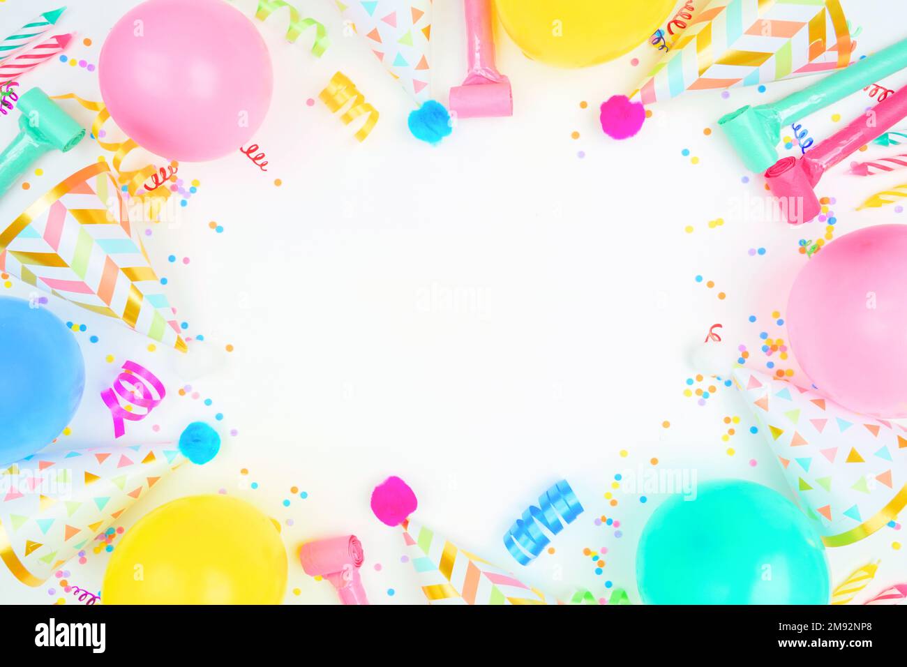 Birthday party frame on a white background. Top view with balloons ...