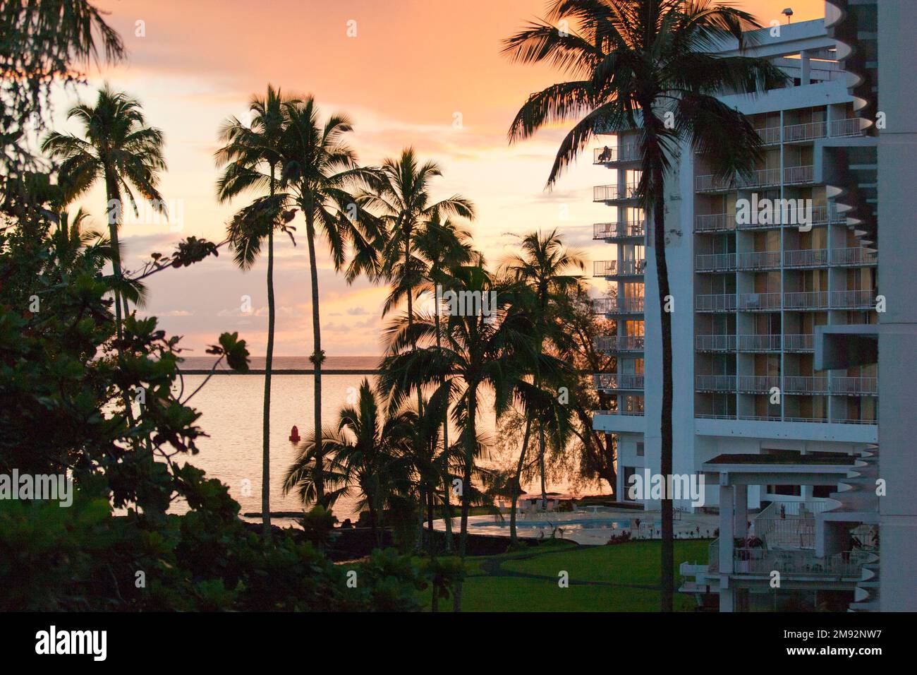 HILO-BIG ISLAND-HAWAII-21-06-2104. A sunrise is seen in the bay of Hilo ...