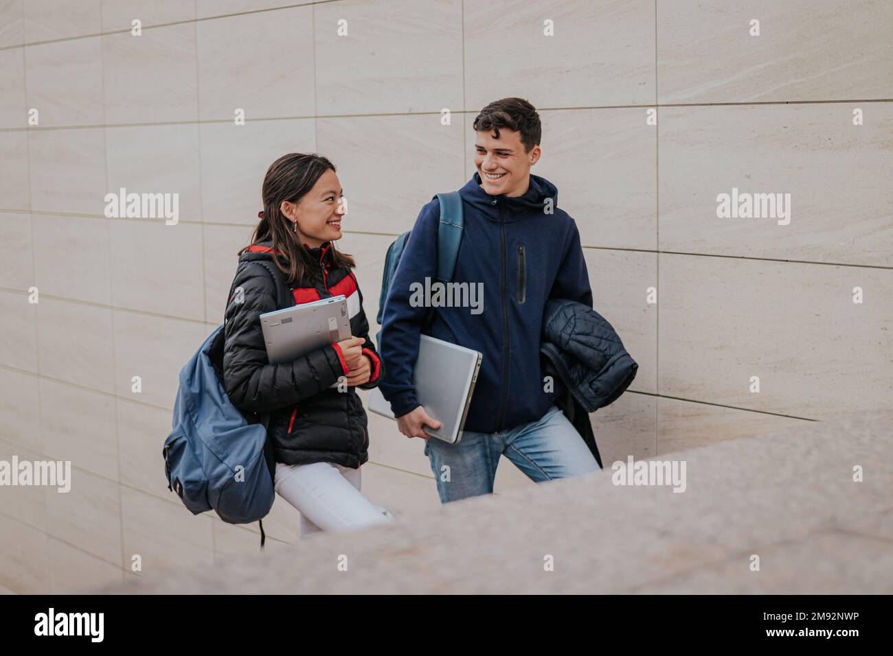Students climbing stairs staircase hi-res stock photography and images ...