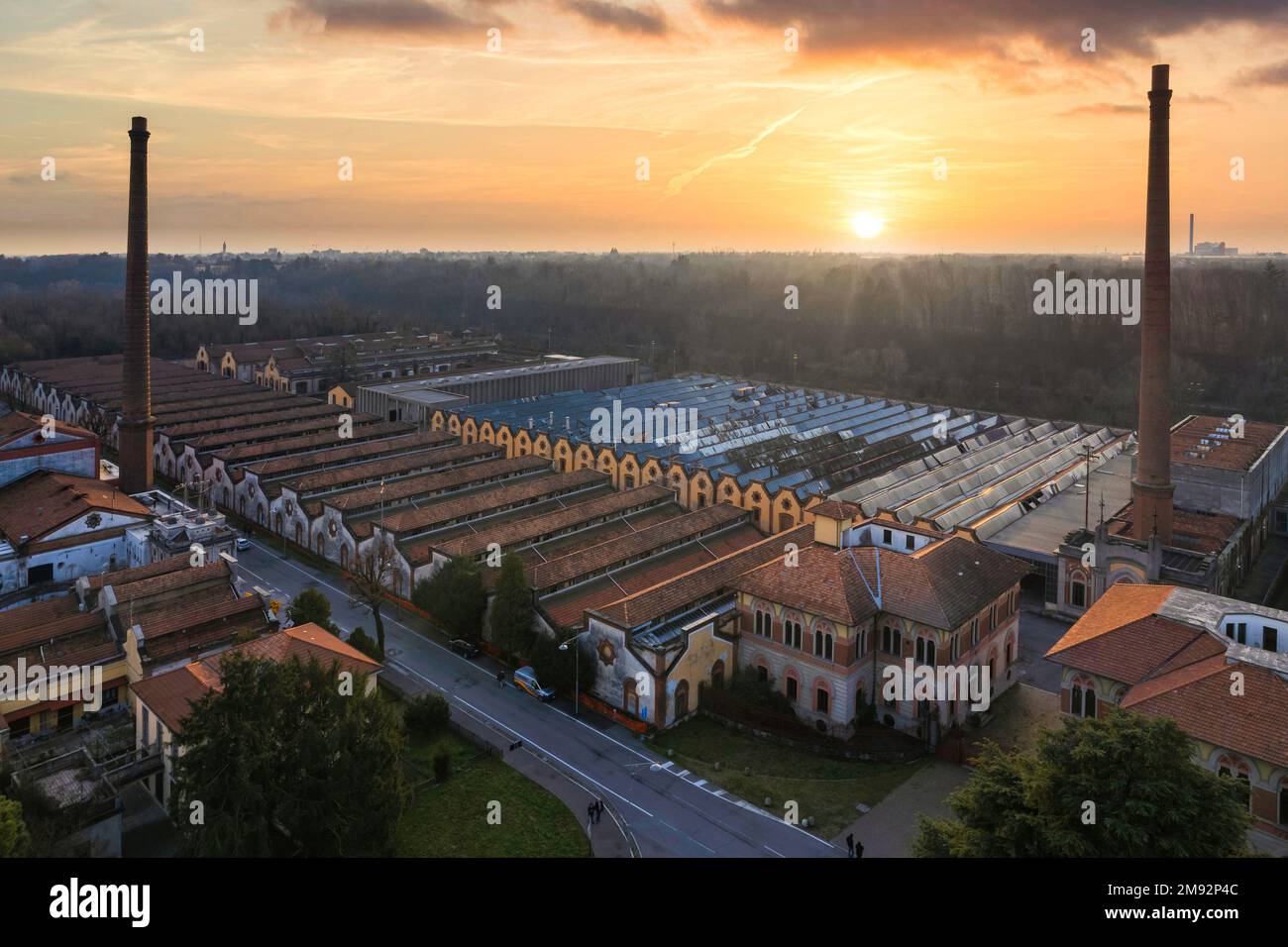 Aerial view of historic worker village of Crespi d'Adda during sunset ...
