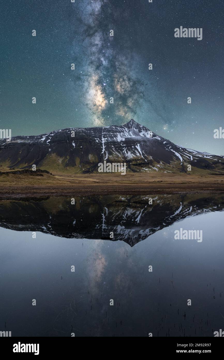 Amazing scenery of glowing stars of Milky Way in night sky over cold ...