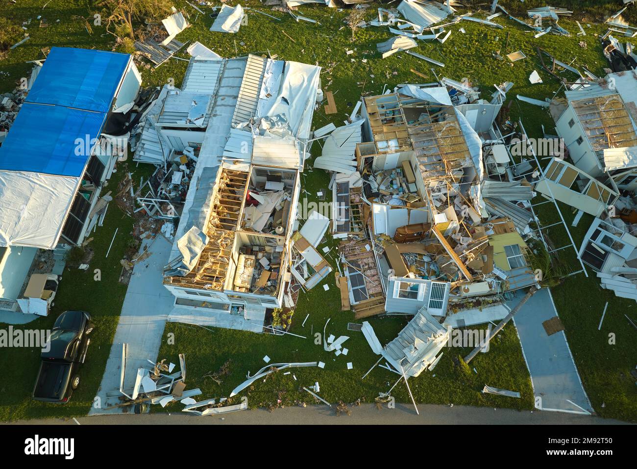 Severely damaged houses after hurricane Ian in Florida mobile home ...