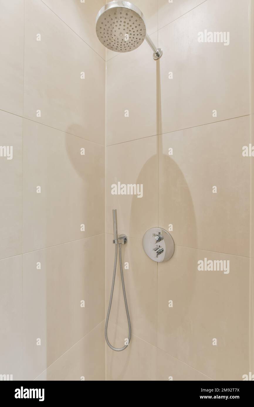 Interior of a modern shower with white walls Stock Photo - Alamy