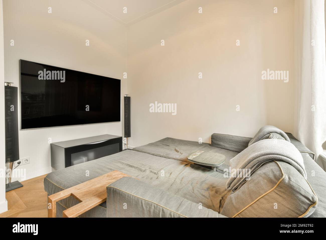 Modern interior of dining room with television by the wall Stock Photo ...
