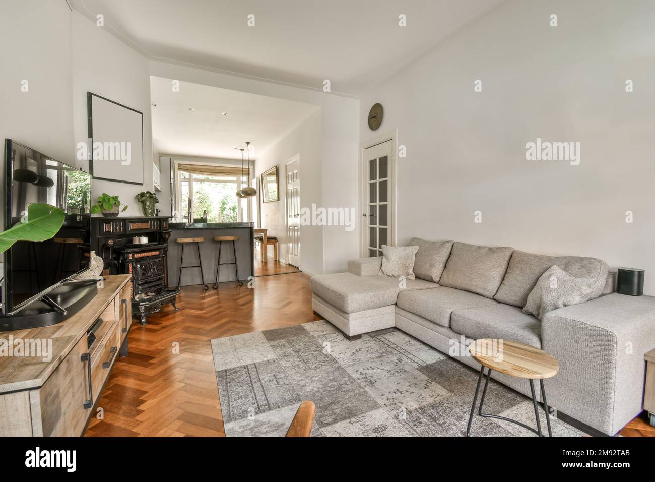 Open plan kitchen with modern appliances and living room with new ...