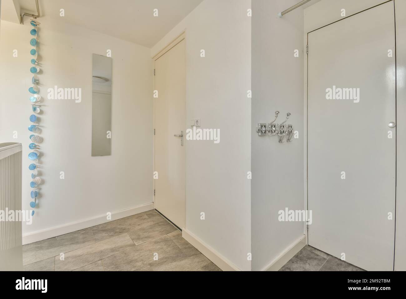 Interior passage way in bright modern house with parquet floor Stock ...